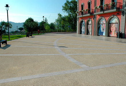 Exposed crushed or washed aggregate paving or precast pebble slabs ...